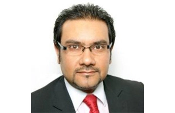 Former Trustee Faisal Rashid, MP becomes Patron of St. Rocco's | St ...